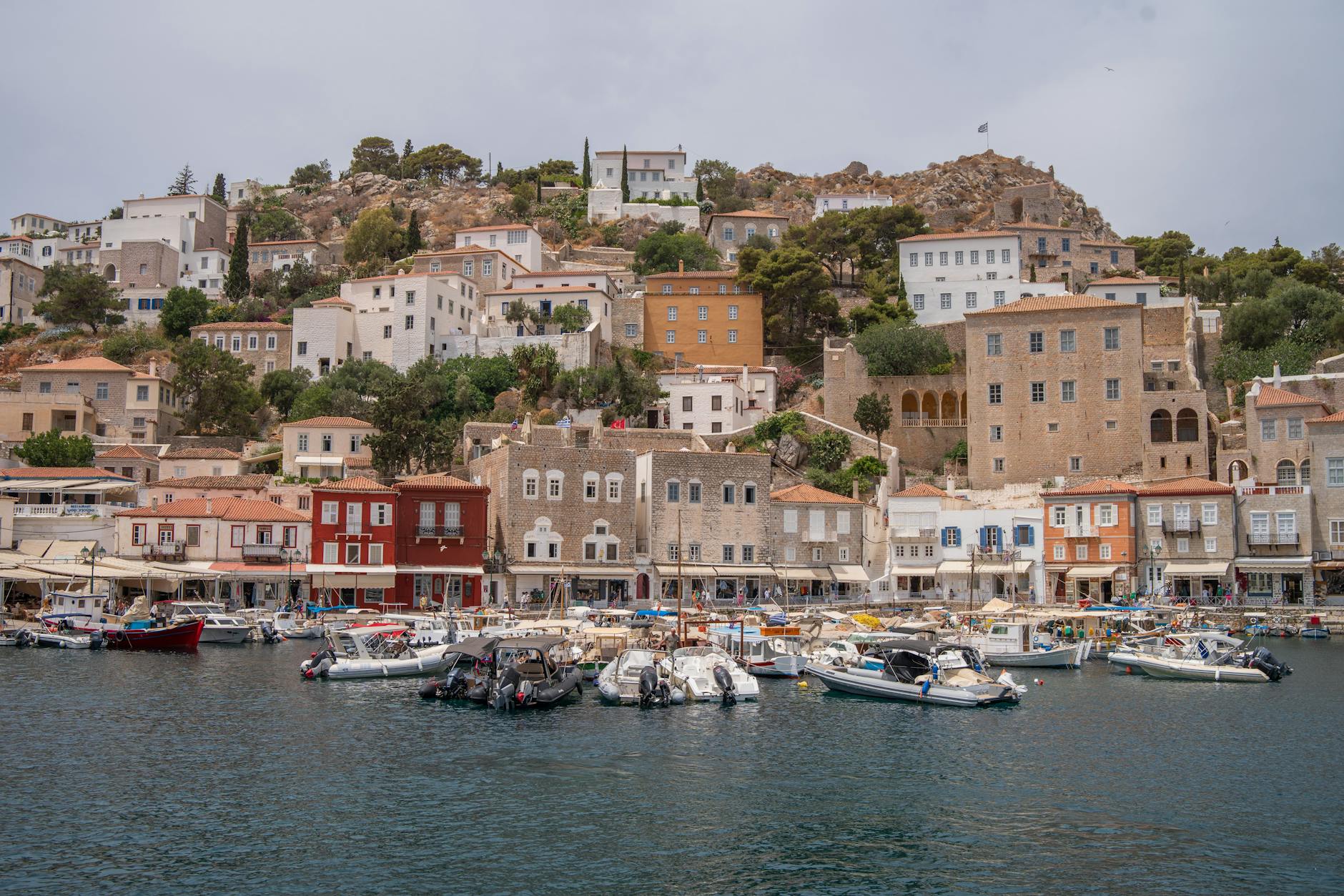 Greek waterfront with boats and calm water