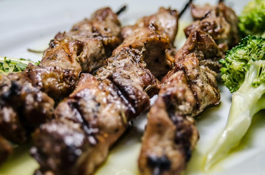 Grilled lamb skewers paired with vegetables