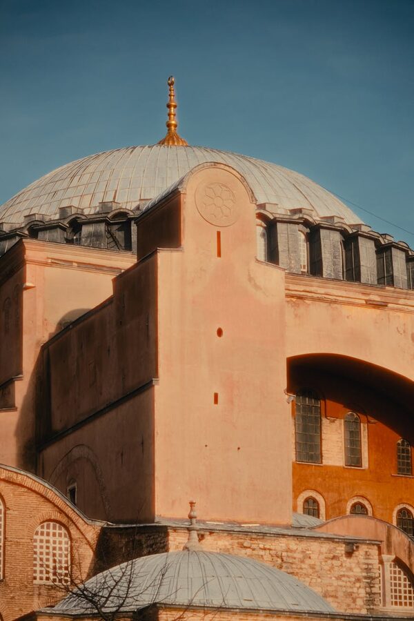 Byzantine architectural details of Hagia Sophia exterior under a clear sky