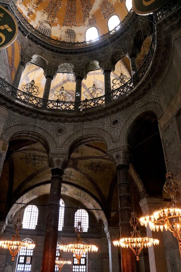 Hagia Sophia domed ceiling with rows of chandeliers below