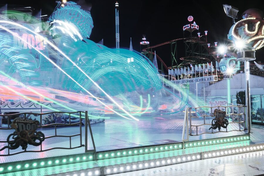 Colorful amusement ride at the Hamburg DOM carnival at night