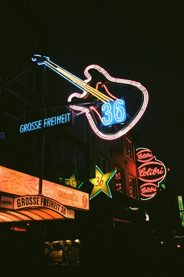 Neon signs illuminating Grosse Freiheit street at night in Hamburg