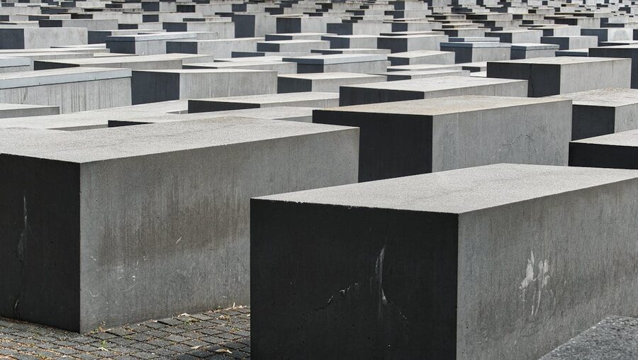 Concrete blocks of the Holocaust Memorial in Berlin showing their massive scale