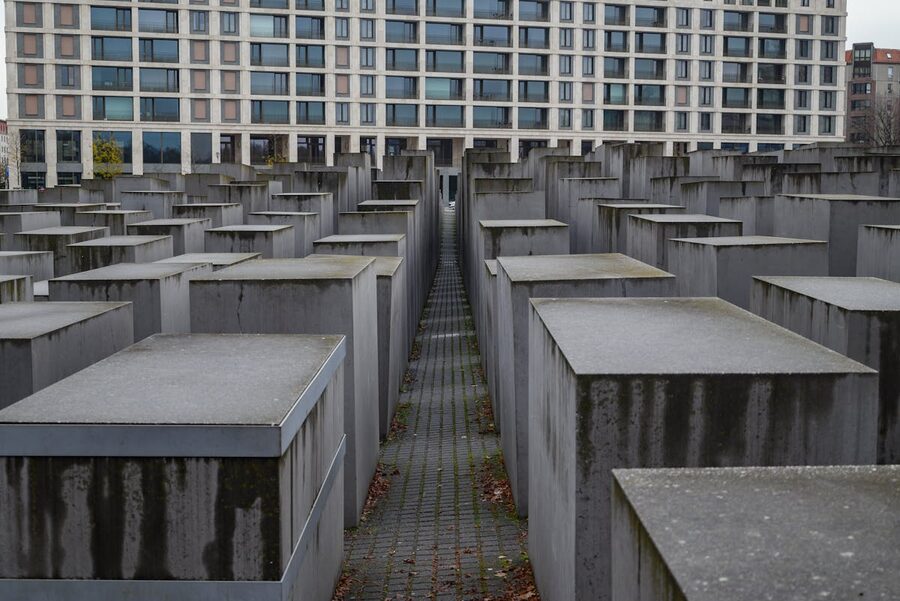 Rows of concrete stelae at the Holocaust Memorial in Berlin extending into the distance