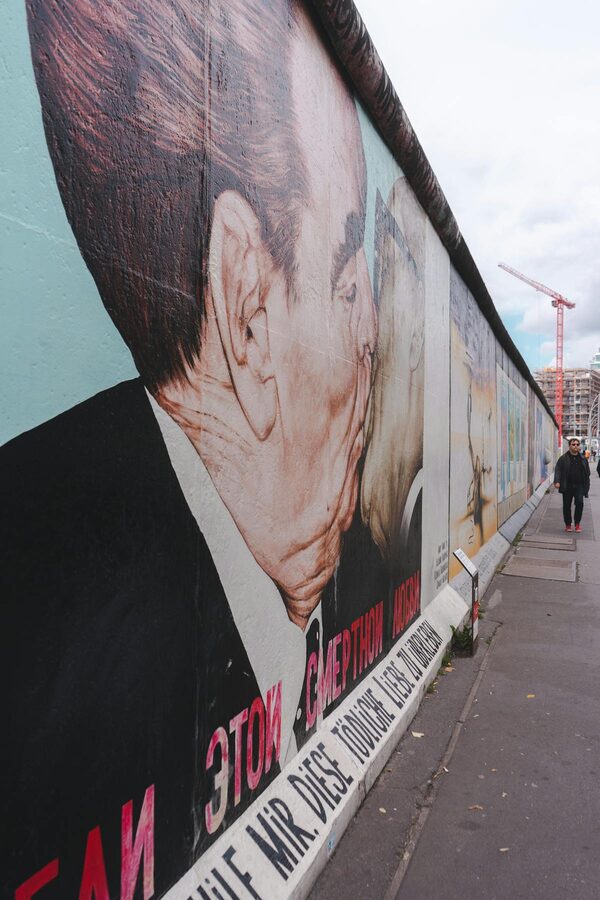Political mural painted on the Berlin Wall at East Side Gallery