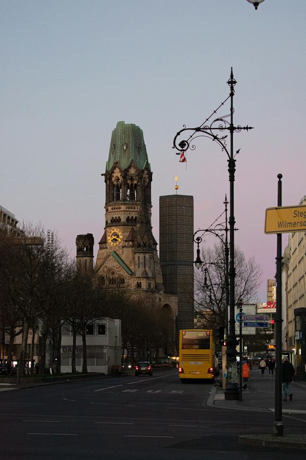 Kaiser Wilhelm Memorial Church at twilight in Berlin with historic architecture