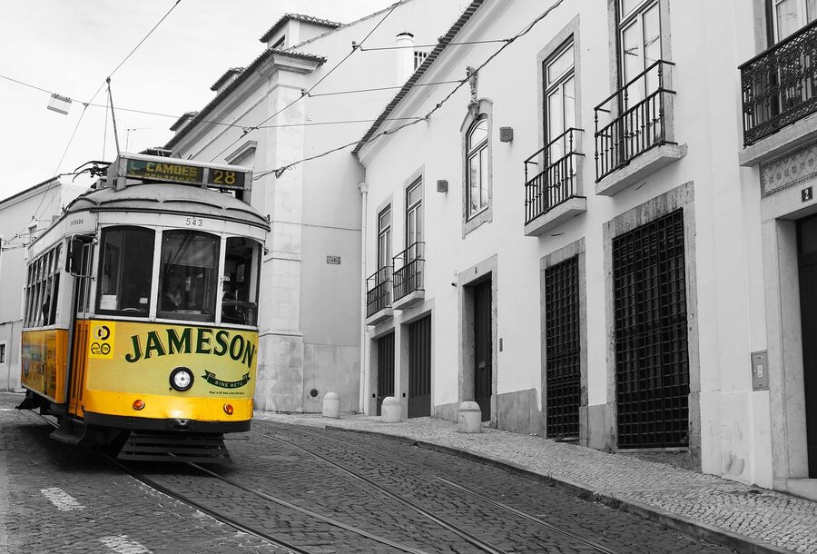Yellow Lisbon tram in the city