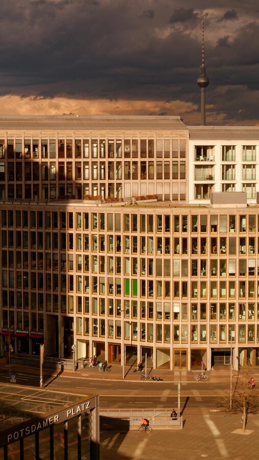 Sunset view of modern buildings at Potsdamer Platz Berlin with dramatic sky