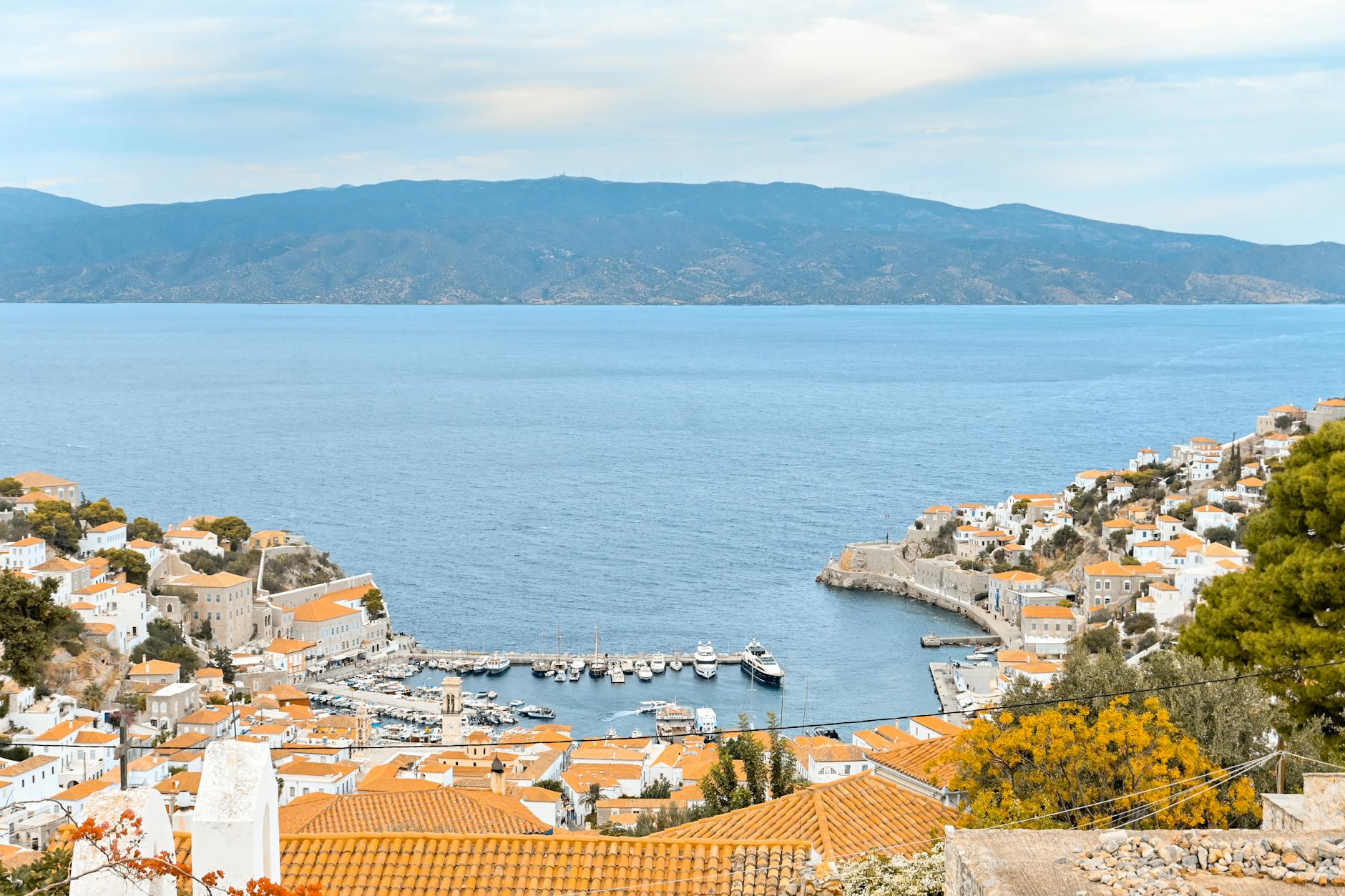 Aerial view of Hydra island with harbor and town