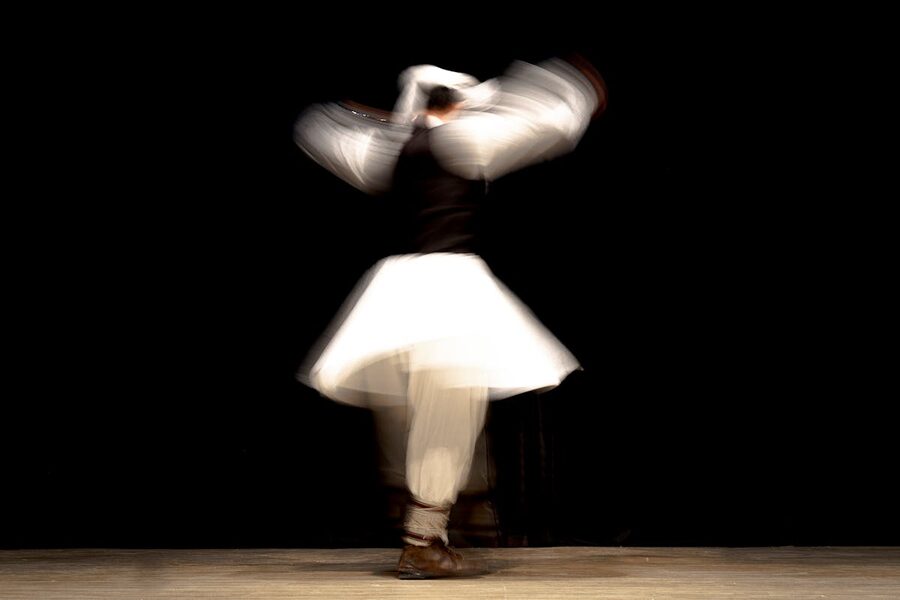 Traditional dancer in motion blur showcasing cultural expression