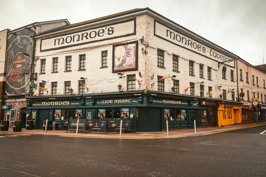 Traditional Irish pub interior with warm lighting and wooden bar