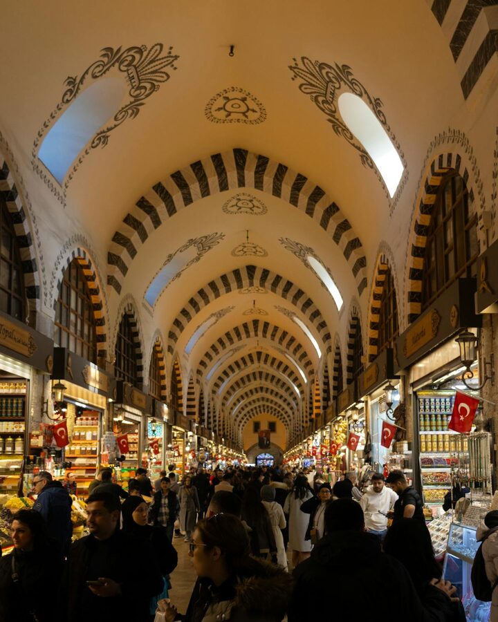 Interior of the Spice Bazaar in Istanbul with crowds and displays of goods