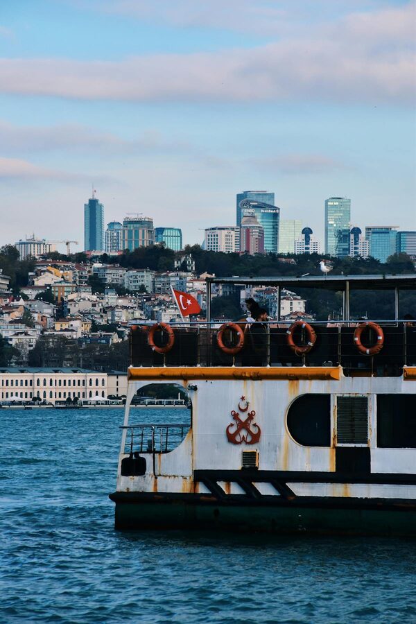 Ferry on the Bosphorus with Istanbul skyline in the background