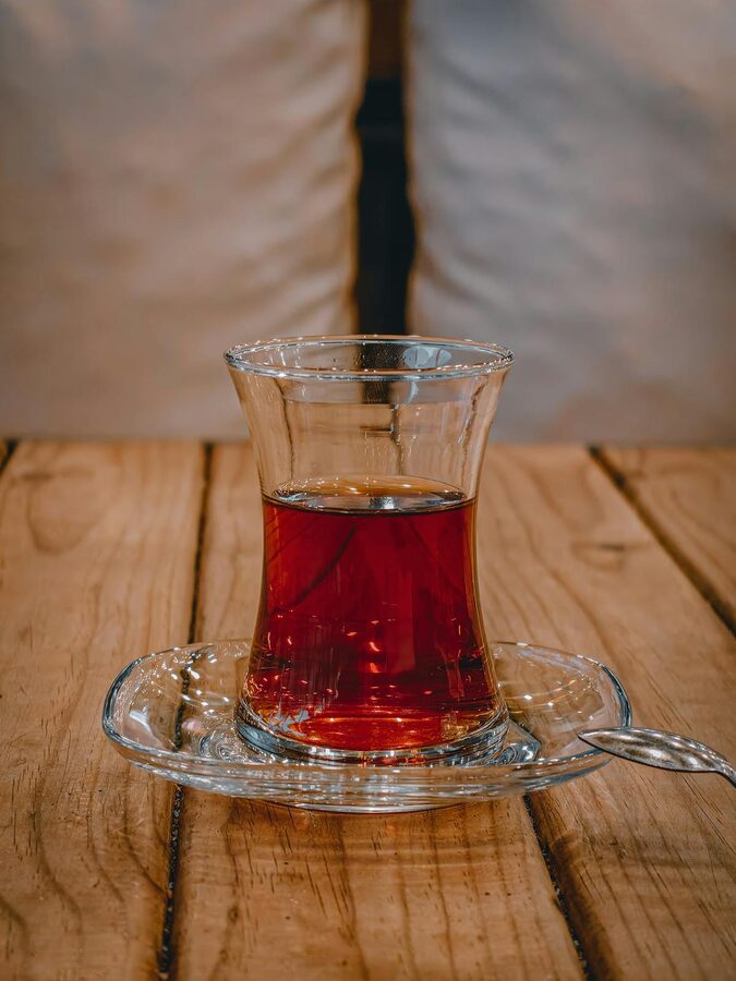 Traditional Turkish tea in a tulip glass at a cafe in Istanbul