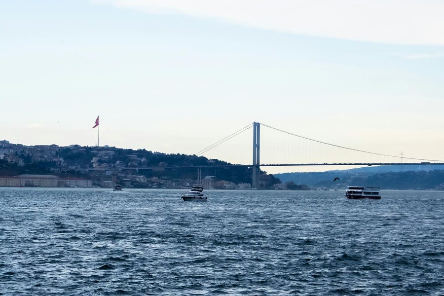 Scenic Bosphorus Bridge view with boats in Istanbul