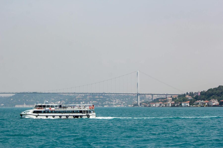 Ferry on the Bosphorus with bridge in the background