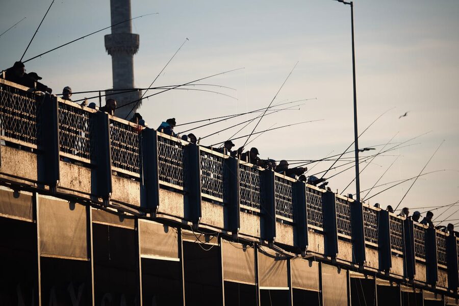 View from Galata Bridge with fishermen in Istanbul