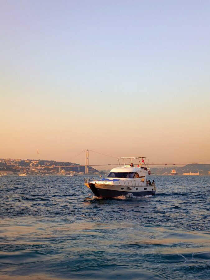 Motor yacht on the Bosphorus at sunset