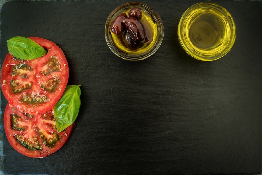 Italian cuisine with basil, tomato, and olives