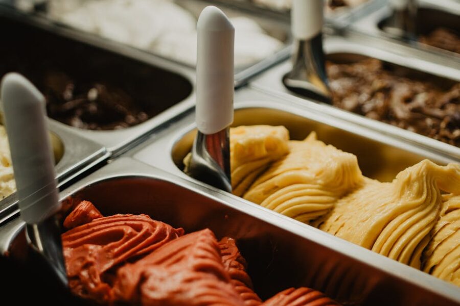Italian gelato in metal trays at gelateria