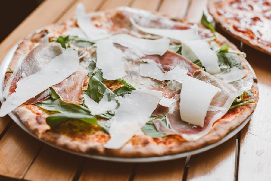 Italian pizza with prosciutto freshly baked