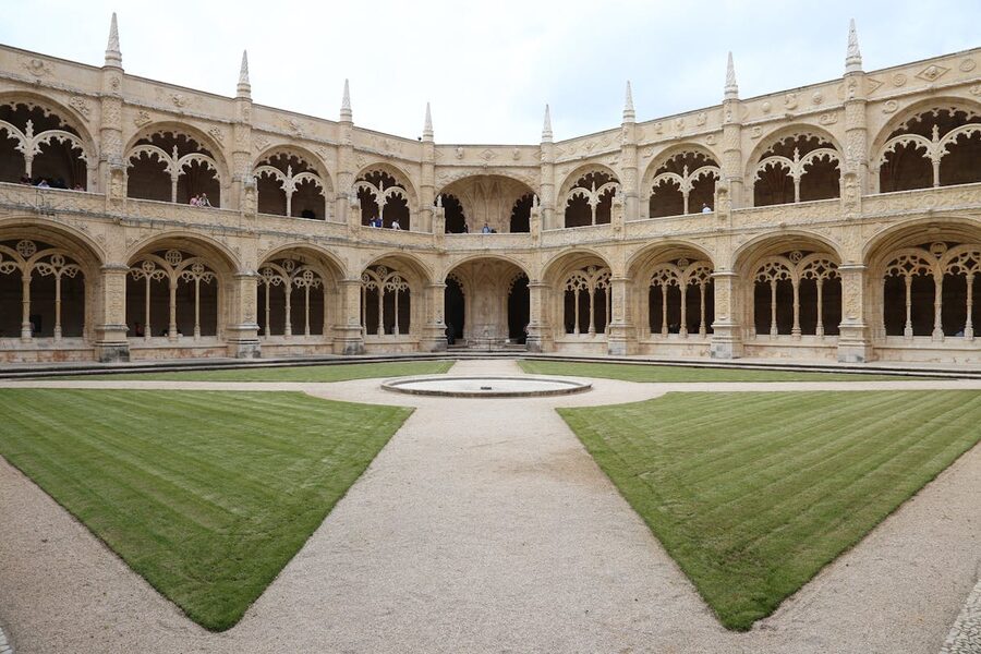 Lower cloister of Jeronimos Monastery with carved arches