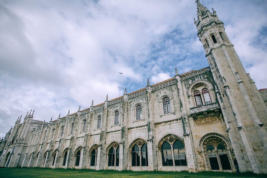 Jeronimos Monastery facade under a cloudy sky