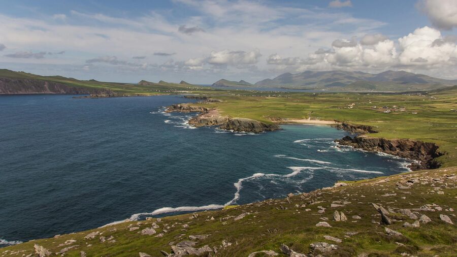 Dingle Peninsula coastline with green hills and Atlantic views