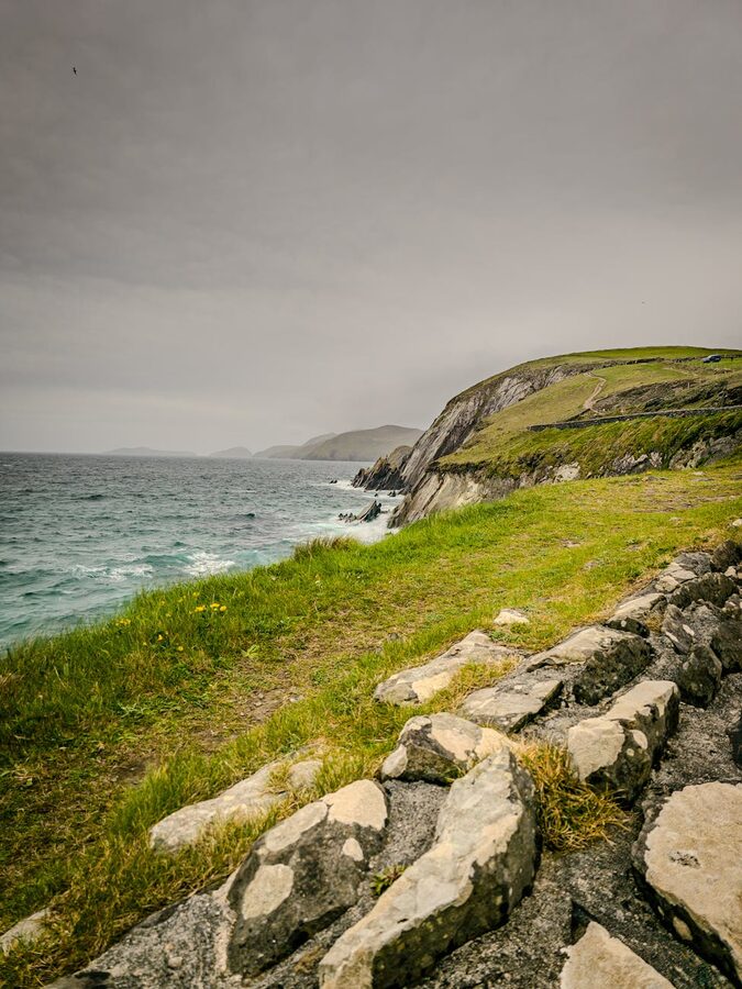 Kerry coastal cliffs with green headlands stretching to the ocean