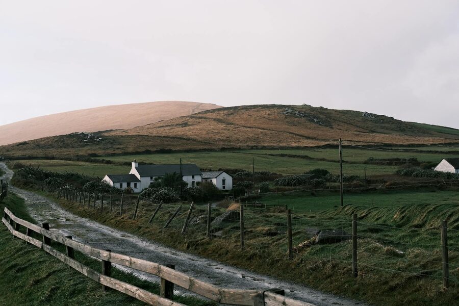 Rural farmhouse and rolling green hills in Killarney