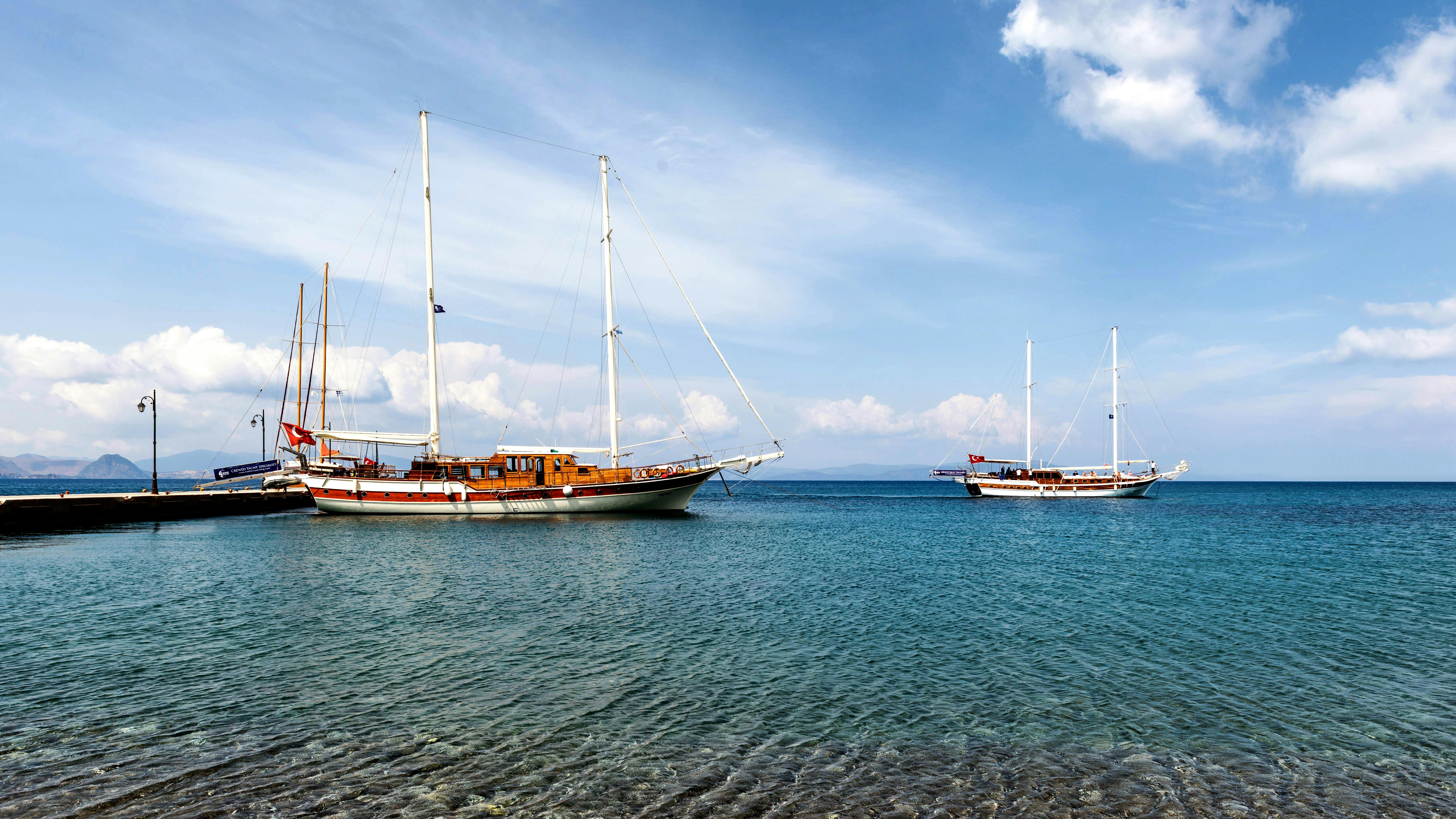 Sailboats on the calm clear waters of Kos