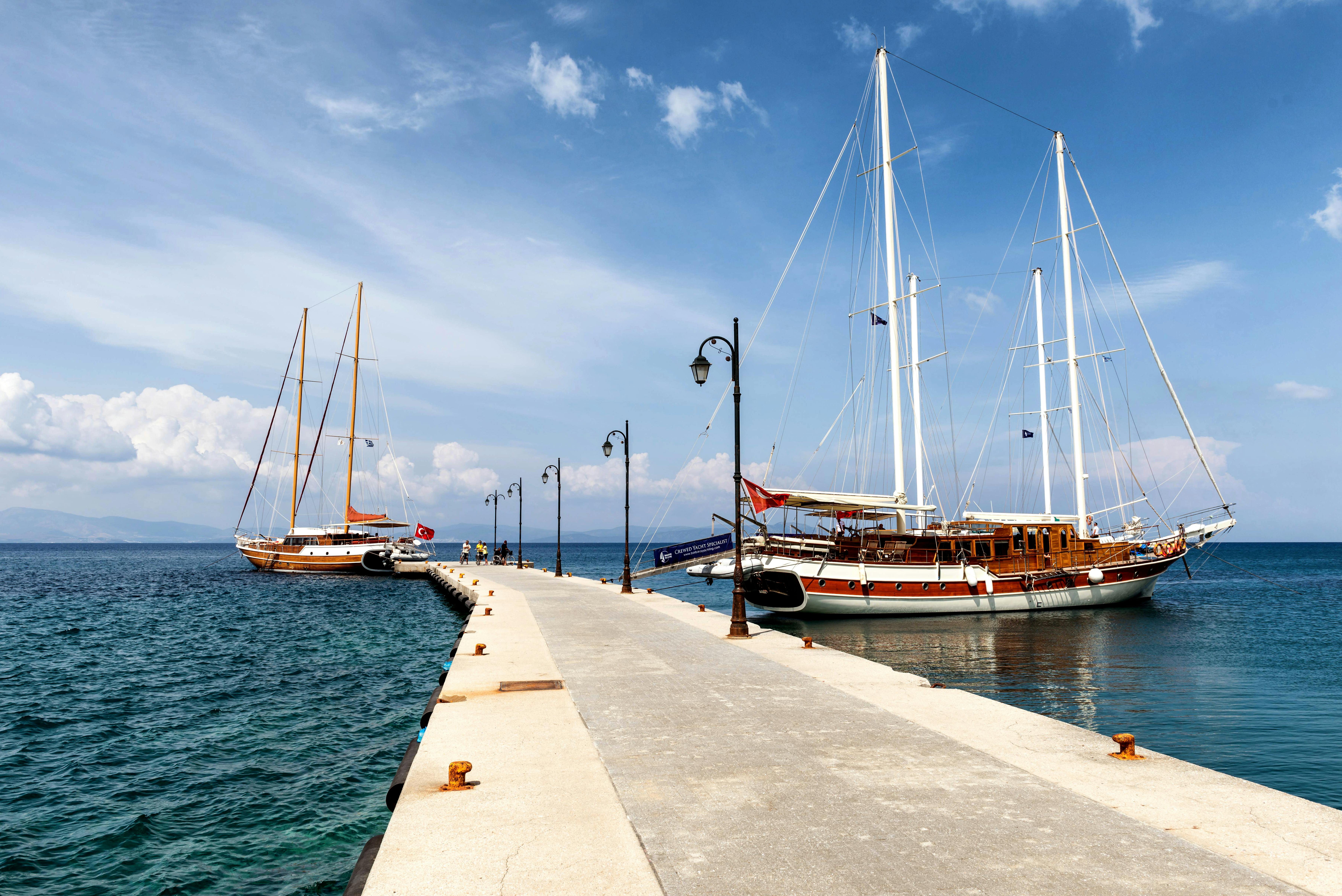 Sailboats moored at a pier in Kos Greece