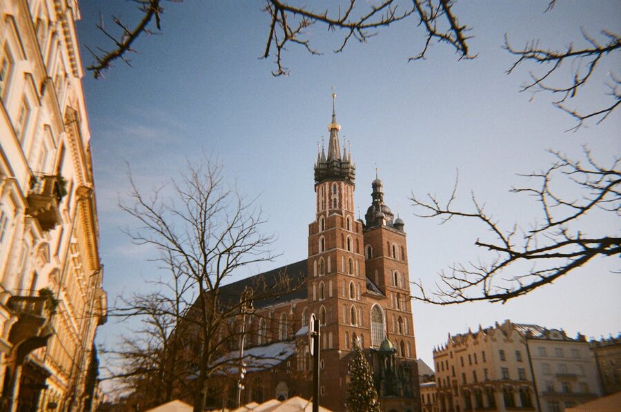St Marys Basilica in Krakow framed by bare branches