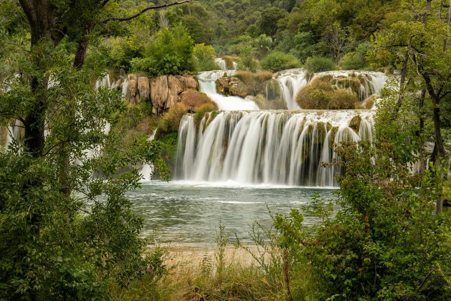 Krka National Park waterfalls surrounded by green trees