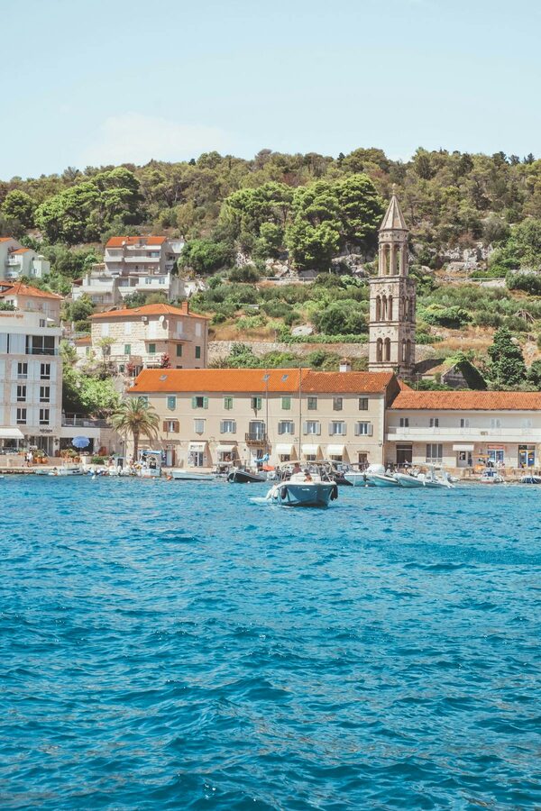 Waterfront with boats and historic architecture Hvar Croatia