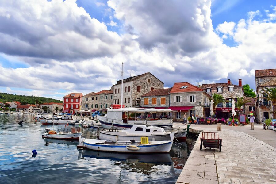 Harbour in Split-Dalmatia Croatia with boats and stone buildings