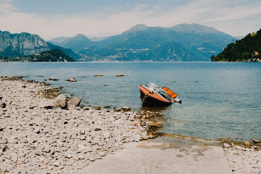 Lake Como tranquil lakeside with boat