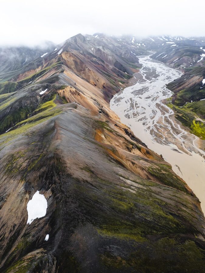 Aerial photograph of Landmannalaugar rhyolite mountain range and river valley