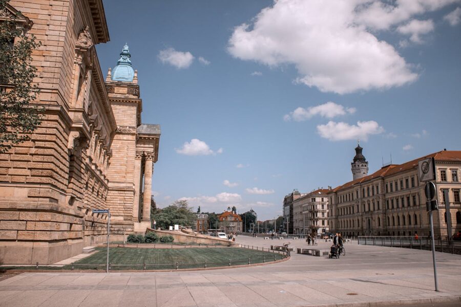 Historic architecture in Leipzig Germany with ornate facades under blue sky