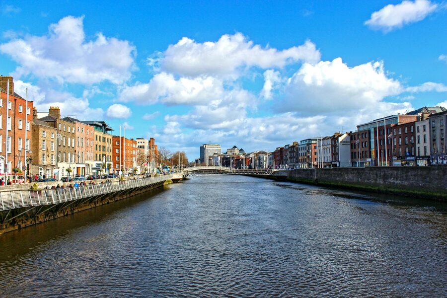 The River Liffey flowing through central Dublin on a grey afternoon