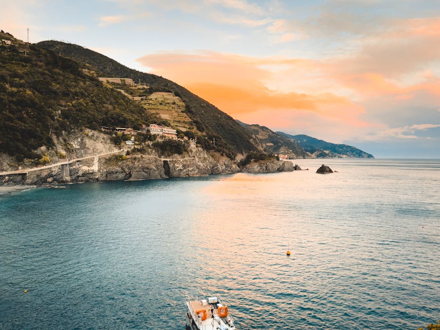 Liguria coastline at sunset with cliffs