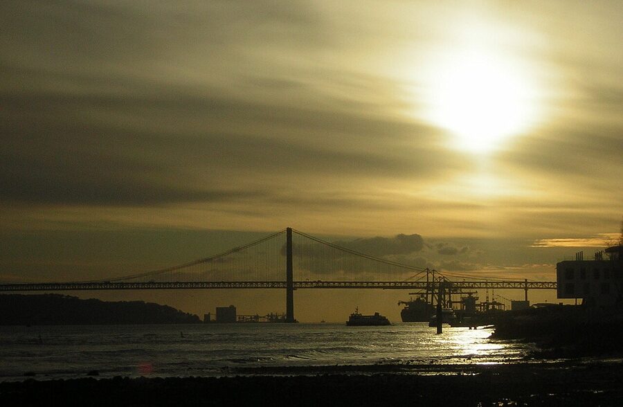 Ponte 25 de Abril bridge at sunset over the Tagus