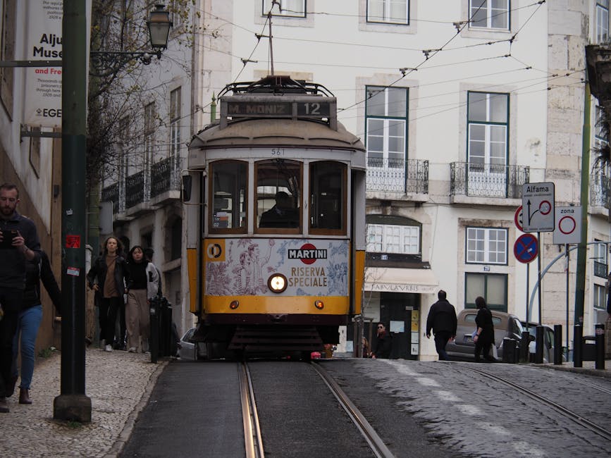 Yellow tram in the Alfama district of Lisbon