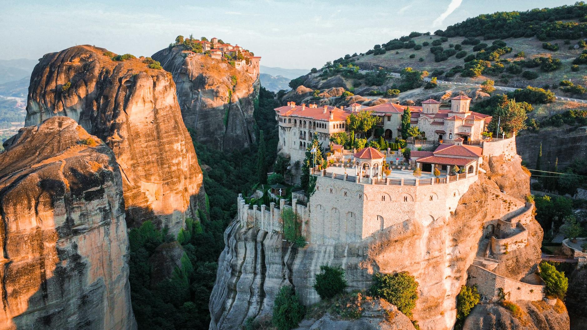 Aerial view of Meteora monasteries perched on rock formations, Greece