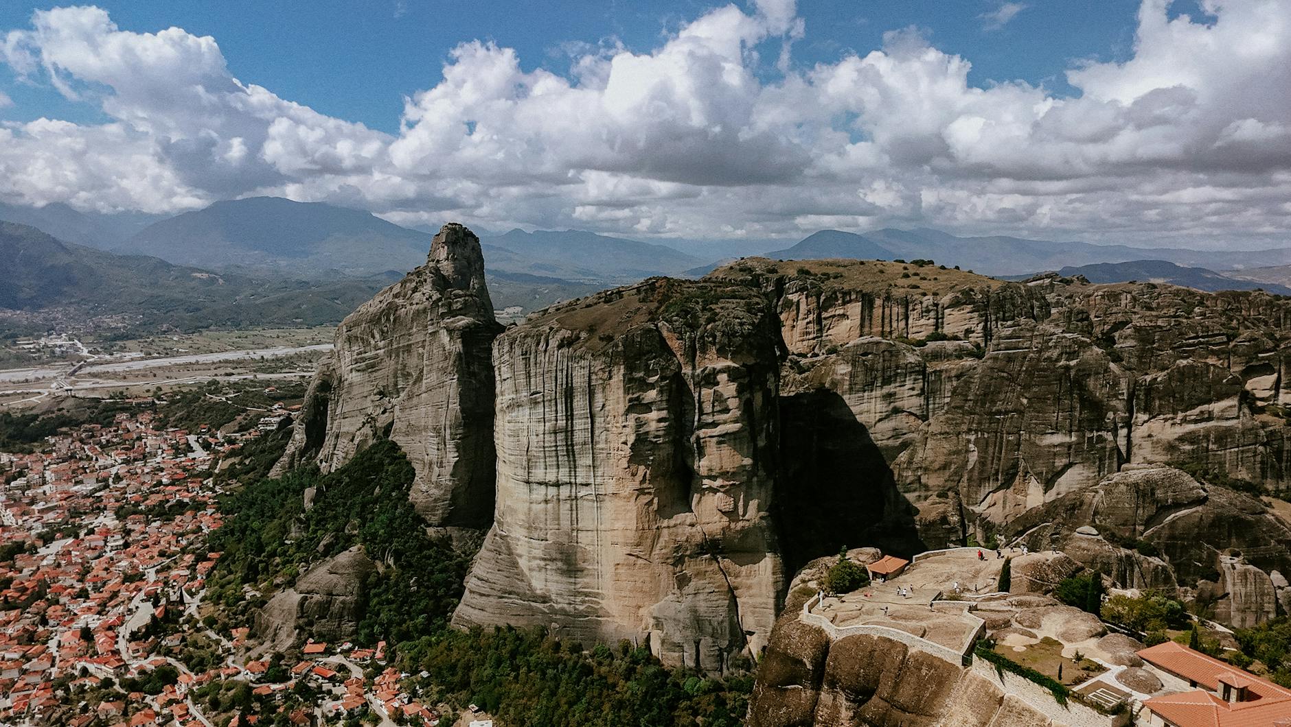 Aerial view of Meteora cliffs and the nearby town of Kalambaka