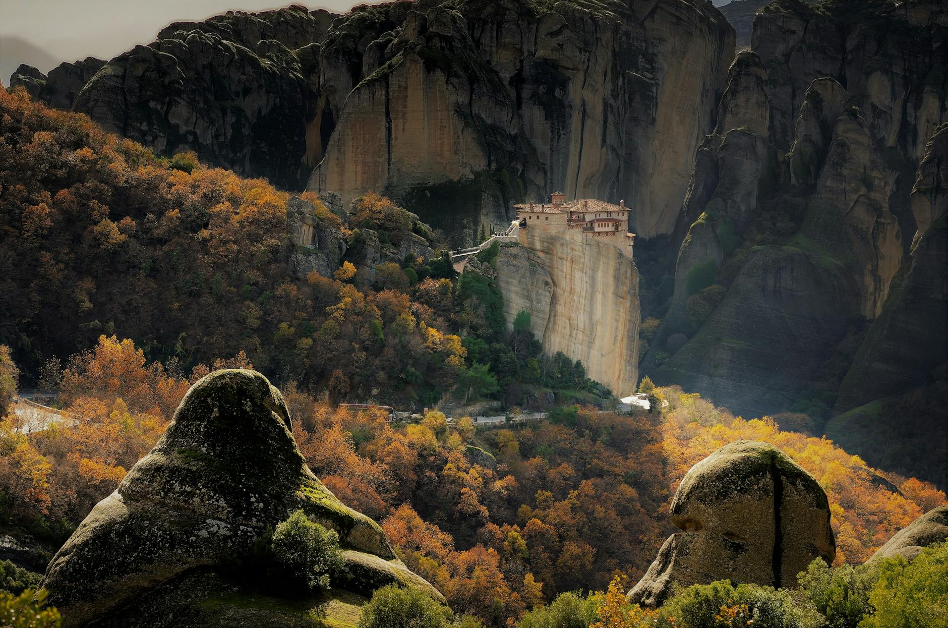 Meteora monastery perched on a vertical cliff face