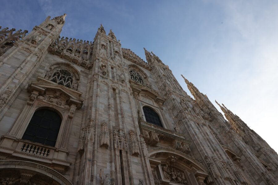 Gothic spires of Milan Cathedral at dawn