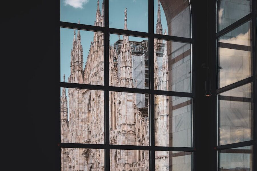 Milan Cathedral reflected in window