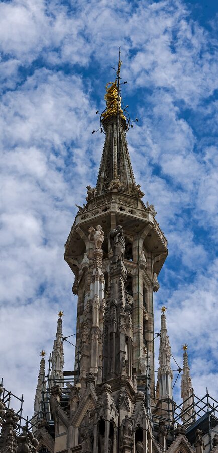 Milan Duomo central spire seen from street level