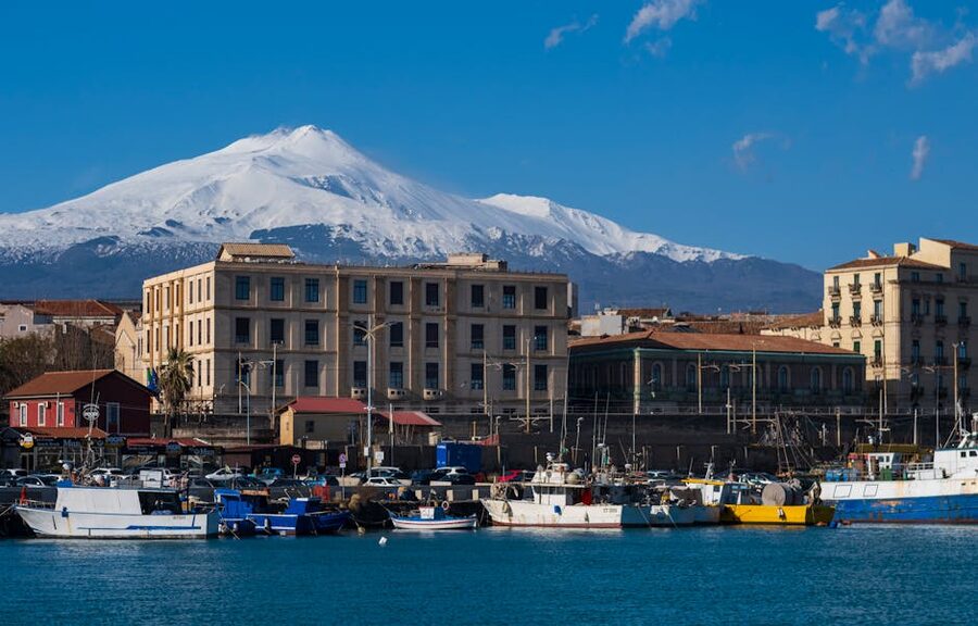 Mount Etna snowy peaks over Catania